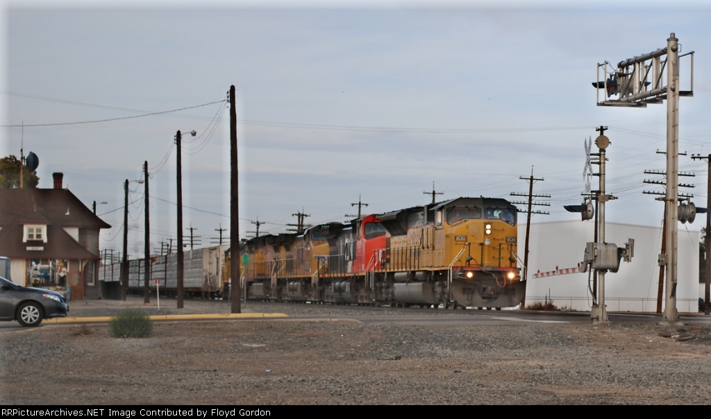 UP 8061 leads a mixed group of seven units eastbound